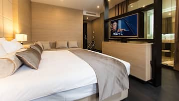 Suíte estúdio executiva | Roupas de cama premium, frigobar, cofres nos quartos, escrivaninha