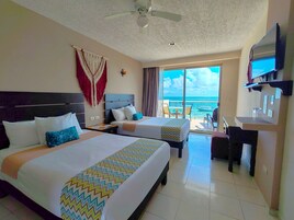 Habitación Premium, Vista al Mar | Cofres nos quartos, escrivaninha, roupa de cama