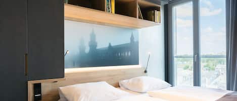 Roupas de cama premium, cofres nos quartos, individualmente decorados