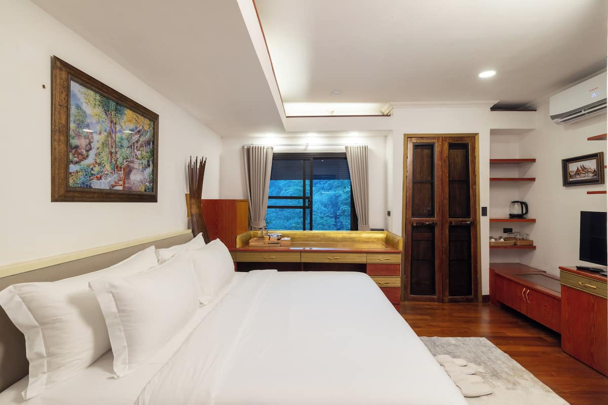 Quarto Familiar | Minibar, secretária, camas desdobráveis, Wi-fi