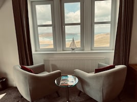 Quarto Duplo Familiar, casa de banho anexa, vista para o mar | Wi-fi grátis, roupa de cama fornecida