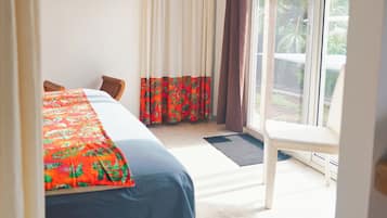 Quarto casal conforto, suíte, vista para o jardim (Apetahi) | Camas com colchões de espuma com sistema de memória