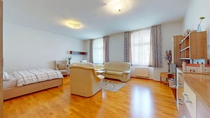 Apartamento Cidade, 1 quarto, cozinha | Sala de estar | TV de ecrã plano