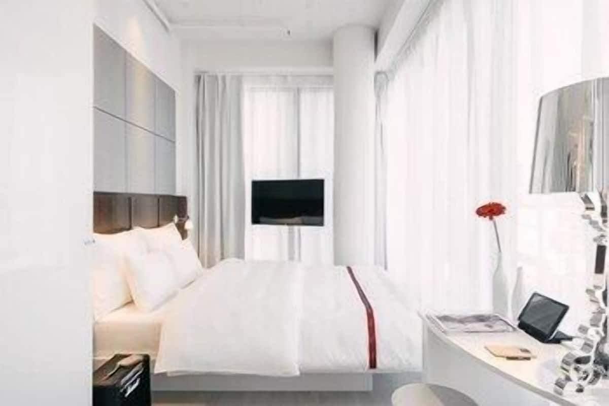 Roupas de cama premium, cofres nos quartos, individualmente decorados