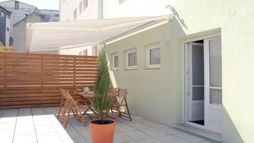 Apartamento, terraço | Terraço/pátio interior