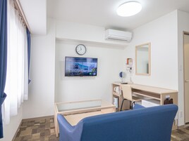 Quarto Twin Deluxe, não fumadores | Secretária, ferro/tábua de engomar, Wi-fi grátis 