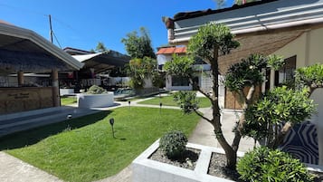 Quarto Familiar, lanai (alpendre havaiano), junto à piscina | Vista da varanda