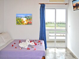 Quarto solteiro standard | Ferros/tábuas de passar roupa, berços grátis, Wi-Fi de cortesia