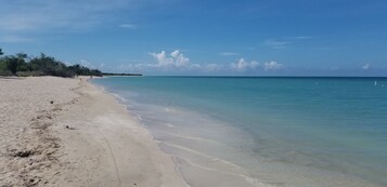 Na praia, praia de areia branca, caiaque 