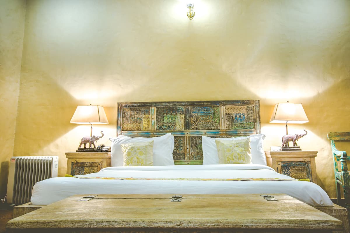 Quarto Signature (Heritage) | 1 quarto, minibar, cofre no quarto, com mobília individualizada