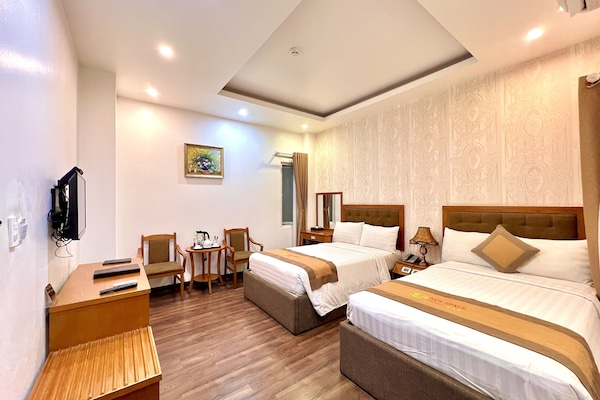 Quarto Twin Superior | Minibar, cofre no quarto, secretária, Wi-fi grátis