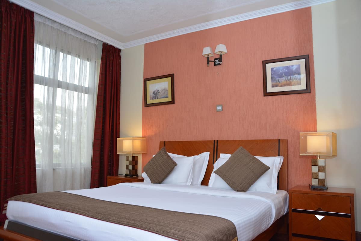 Apartamento executivo, 1 quarto | 1 quarto, roupas de cama premium, cofres nos quartos