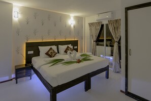 Quarto luxo, 1 cama King, vista para o jardim | Roupas de cama premium, frigobar, cofres nos quartos