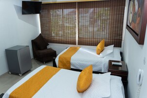 Quarto Standard, 2 camas individuais | Minibar, Wi-fi grátis, roupa de cama fornecida 