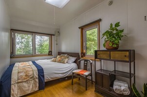 Cabana standard | Cortinas blackout, Wi-Fi de cortesia, roupa de cama