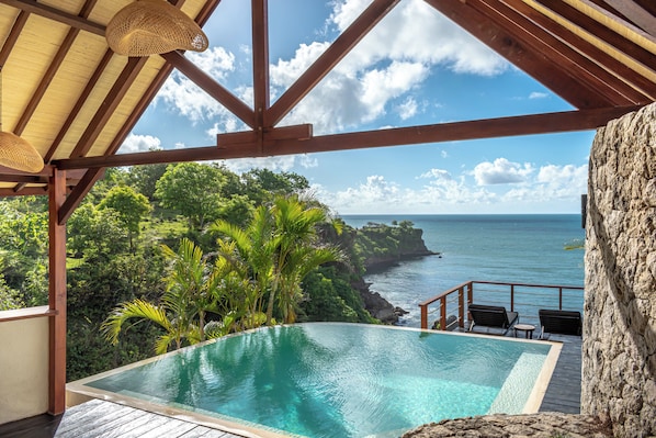 Quarto premium, vista para o oceano | Terraço/pátio