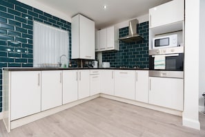Apartamento, casa de banho privativa (2 Bedroom Occupancy 7) | Cozinha partilhada