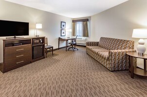 Suite Deluxe, 1 cama king-size, não fumadores (One-Bedroom) | Secretária, cortinas/cortinados opacos, quartos insonorizados 