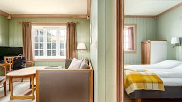 Apartamento panorâmico, 2 quartos | 2 quartos, camas com colchões pillow-top, cortinas blackout