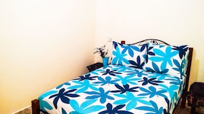 Apartamento família, vários quartos | Cortinas blackout, roupa de cama
