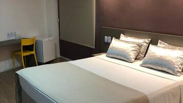 Suíte | Frigobar, cofres nos quartos, escrivaninha, cortinas blackout