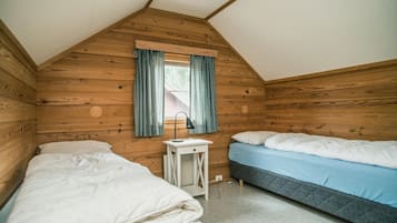 1 quarto, escrivaninha, cortinas blackout, quartos à prova de som