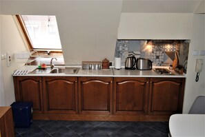 Apartamento Comfort, 1 quarto, cozinha | Secretária, ferro/tábua de engomar, Wi-fi grátis