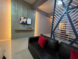 Studio Suite Room | Cofres nos quartos, escrivaninha, cortinas blackout, Wi-Fi de cortesia