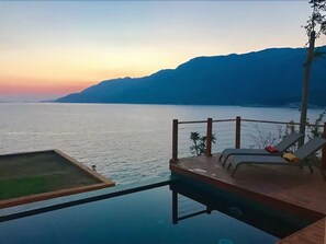 Quarto romântico, piscina particular, vista para o mar | Vista do quarto