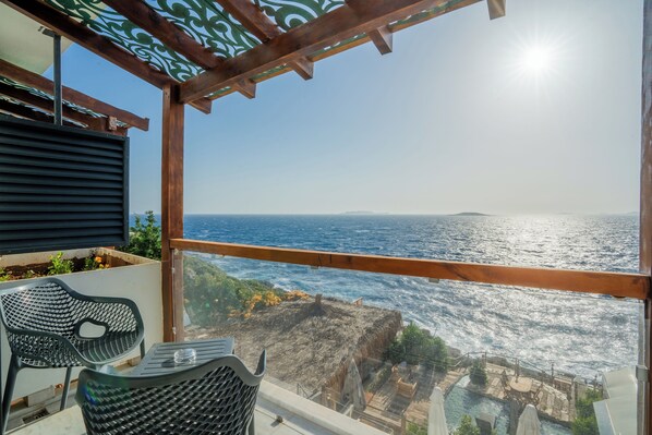 Quarto luxo, vista para o mar | Terraço/pátio