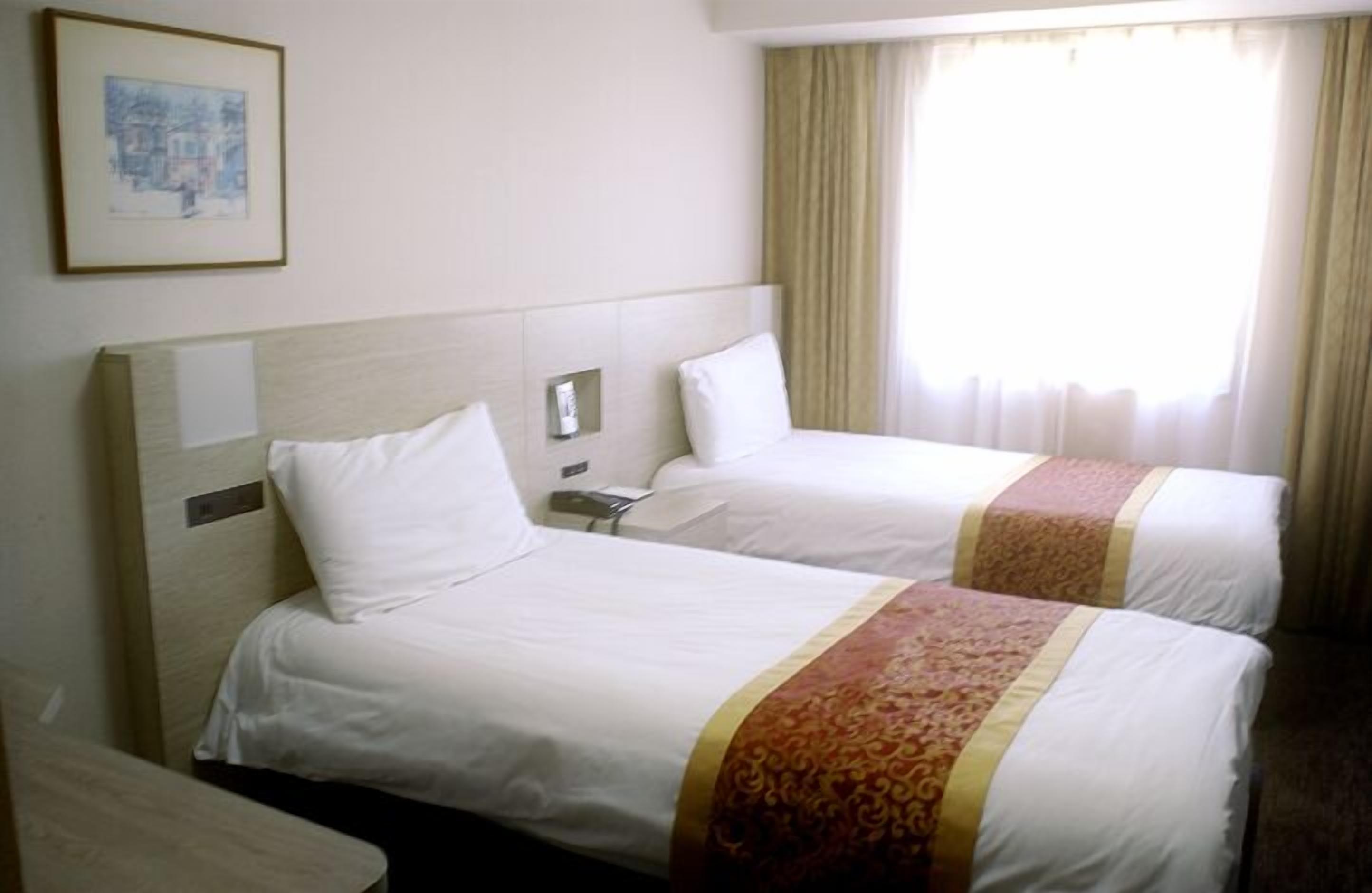 Quarto Twin Standard, não fumadores | Ferro/tábua de engomar, Wi-fi grátis, roupa de cama fornecida 