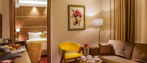 Junior Suite | Sala de estar | TV LCD