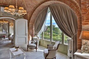 Suíte júnior (La Limonaia) | Área de estar | TV LCD