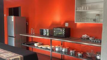 Casa Deluxe | Cozinha privada | Uma chaleira elétrica