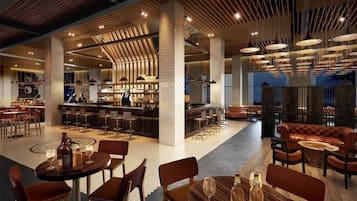 2 bares/lounges, um bar junto à piscina, um bar de praia