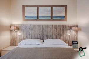 Apartamento, 1 quarto | Secretária, ferro/tábua de engomar, berços/camas para crianças 