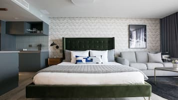 Suíte estúdio panorâmica, 1 cama King e sofá-cama, cozinha, vista para o oceano | Área de estar | TV de tela plana, Netflix, filmes pagos