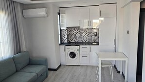 Apartamento Familiar | Sala de estar | Televisor LCD de 32 polegadas com canais via satélite, televisor 