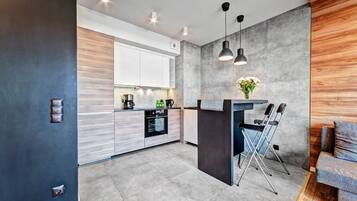 Apartamento (Venezia) | Sala de estar | Televisor de ecrã plano de 55 polegadas com canais por cabo, televisor
