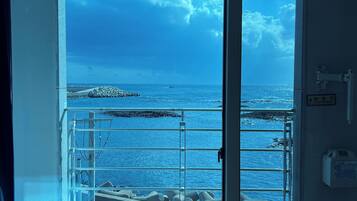 Quarto Twin Deluxe, 2 camas queen-size, vista para o oceano | Wi-fi grátis, roupa de cama fornecida