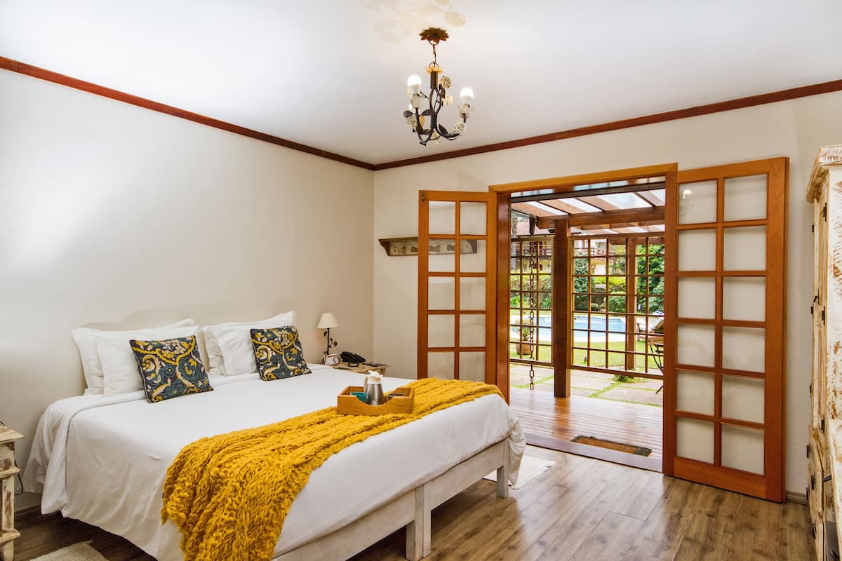 Apartamento Logde Terreo - Frente piscina Familia | 1 quarto, minibar, cofre no quarto, cortinas/cortinados opacos