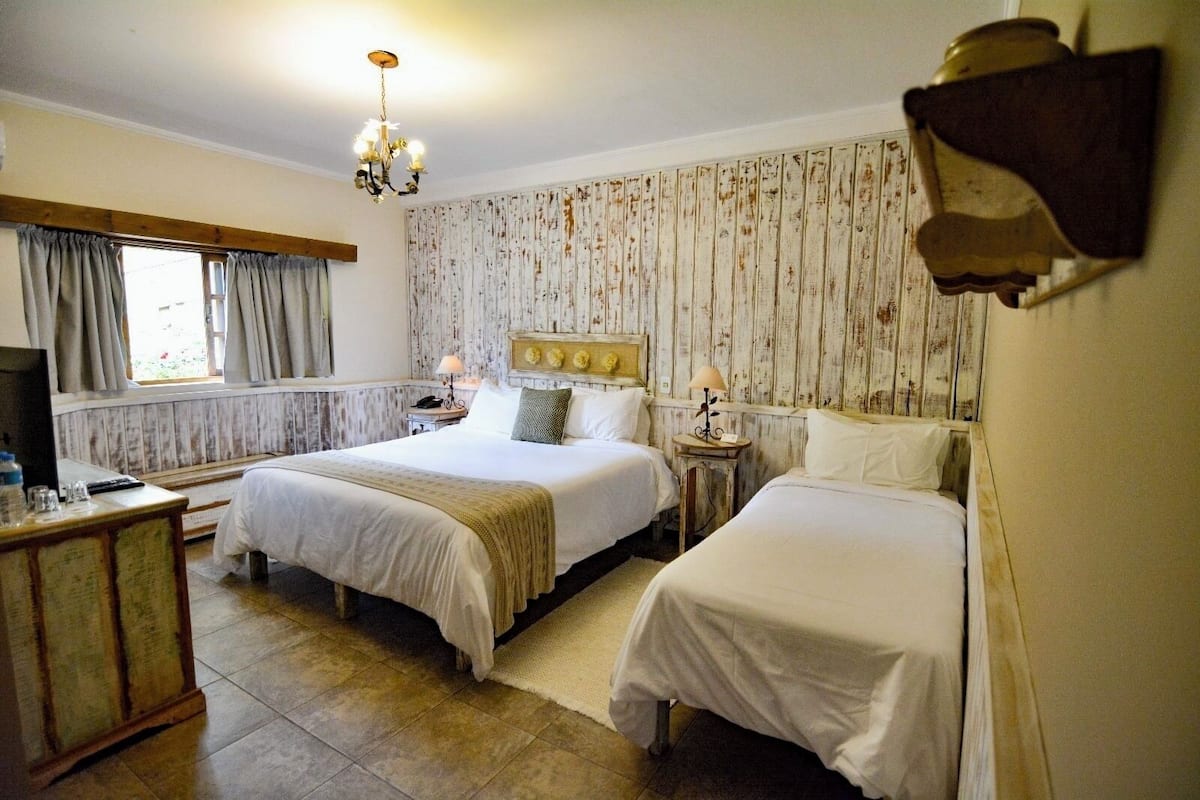 Apartamento Triplo Standard | 1 quarto, minibar, cofre no quarto, cortinas/cortinados opacos