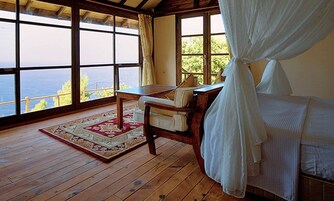 Bangalô luxo, vista para o mar | Roupas de cama premium, individualmente decorados