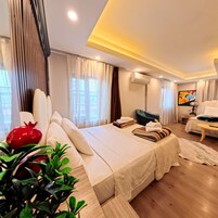 Quarto Quádruplo Comfort, vista para a montanha | 2 quartos, lençóis italianos Frette, roupa de alta qualidade 