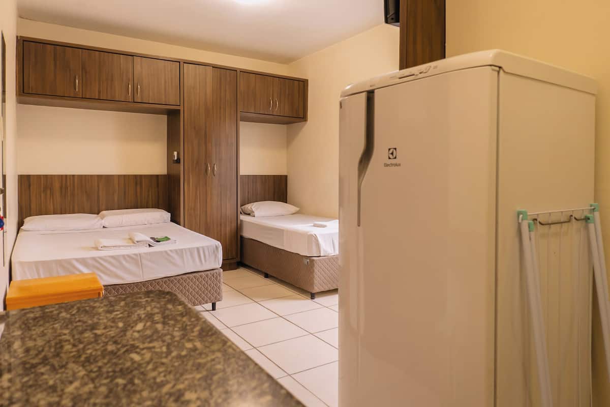 Estúdio | Cortinas blackout, Wi-Fi de cortesia, roupa de cama