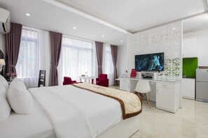 Suíte panorâmica, 1 quarto, para não fumantes, vista para a cidade | Comodidades do quarto