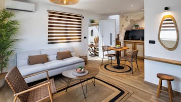 Apartamento Deluxe, vista para o mar | Cortinas/cortinados opacos, quartos insonorizados, Wi-fi grátis