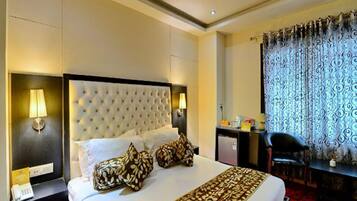 Minibar, secretária, quartos insonorizados, ferro/tábua de engomar