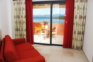 Quarto Quádruplo Standard | Minibar, cofre no quarto, secretária, berços/camas para crianças 