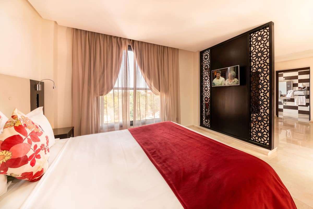 Suíte júnior | Roupas de cama premium, frigobar, cofres nos quartos, escrivaninha